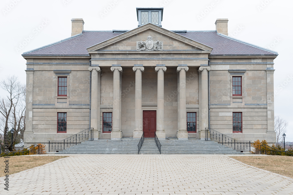 A wide brick entrance to a large courthouse, justice or government ...