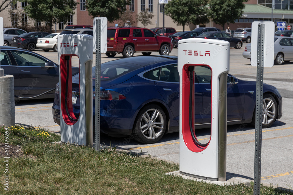 Tesla EV electric vehicle charging. Tesla products include electric ...