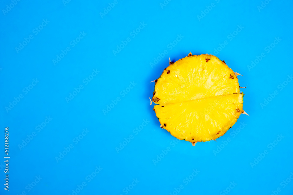 round pineapple slice on a special summer pastel blue background Stock ...