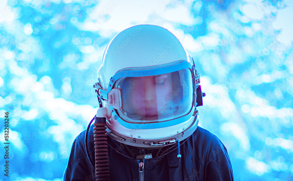 Space helmet. Astronaut girl in space helmet. Young girl in an ...