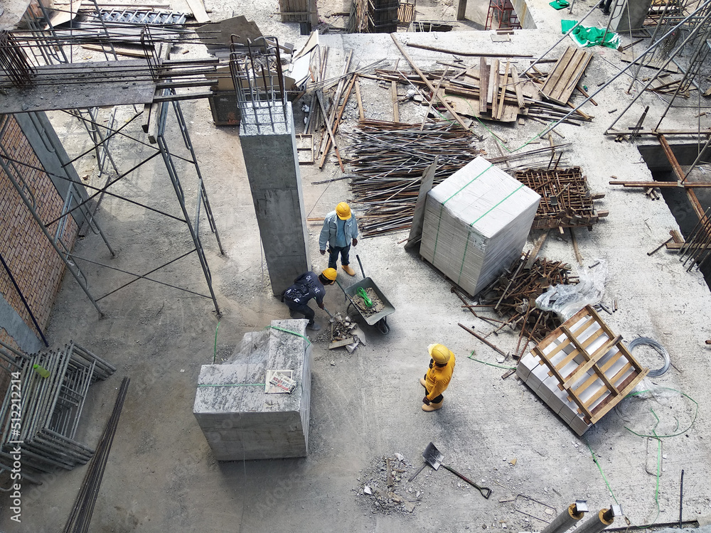 SELANGOR, MALAYSIA -JULY 6, 2021: Construction workers are carrying out ...