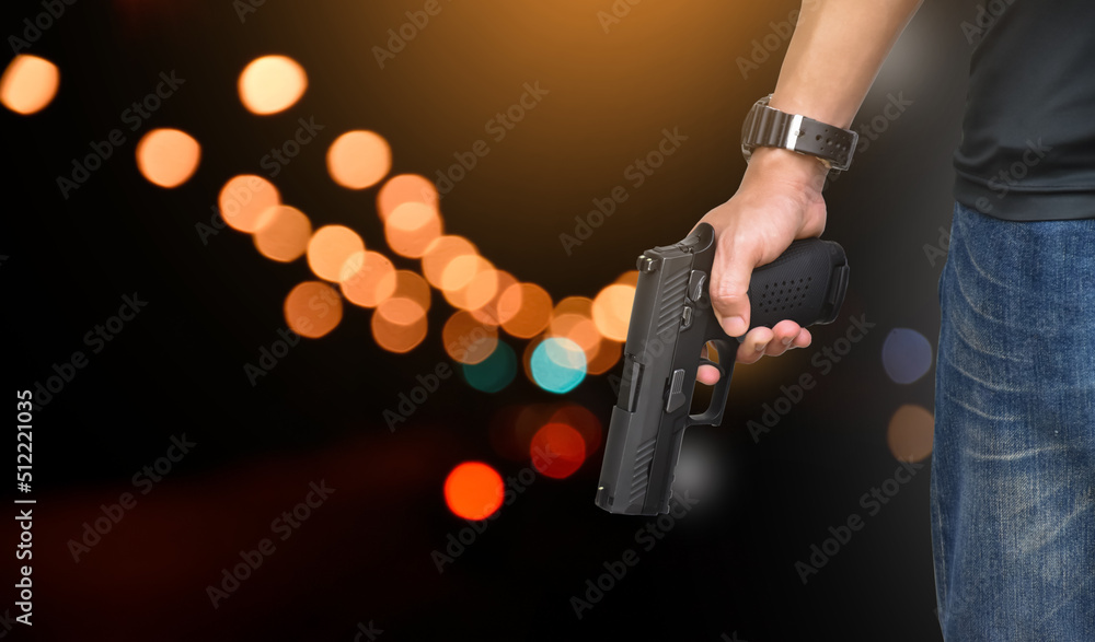 9mm automatic pistol holding in right hand of shooter, concept for ...