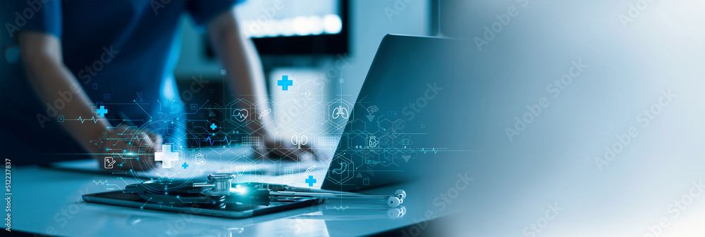 Medicine doctor writing electronic medical record of patient on laptop ...