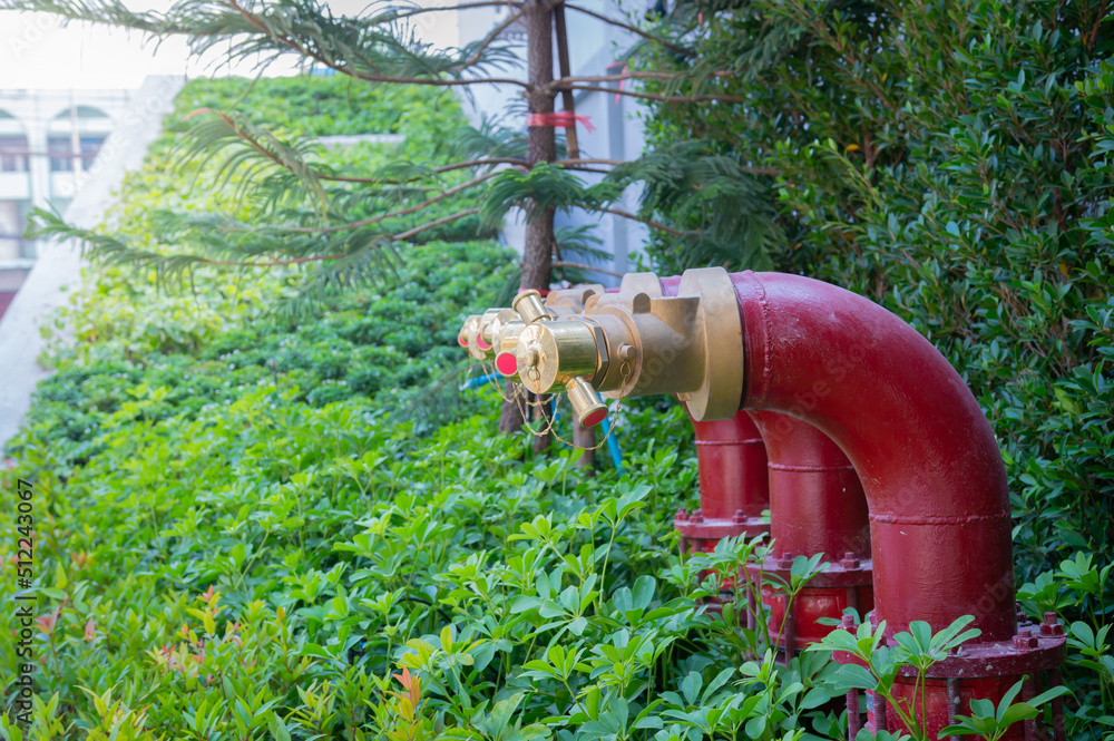 Fire department connection (90 Degree )on footpath outside the building ...