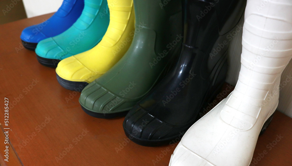Safety boots made of rubber. Workers wear these shoes when in wet and ...