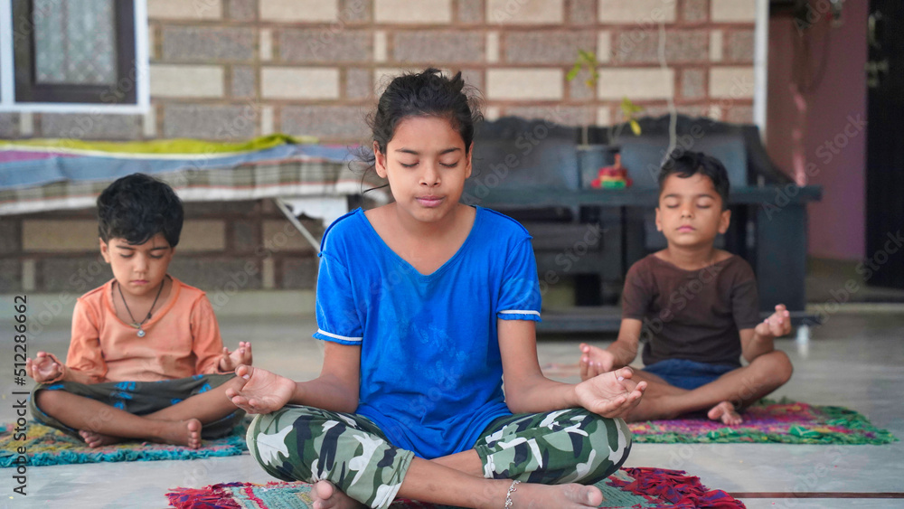 Asian kids doing yoga pose at home. Group of children doing gymnastic ...