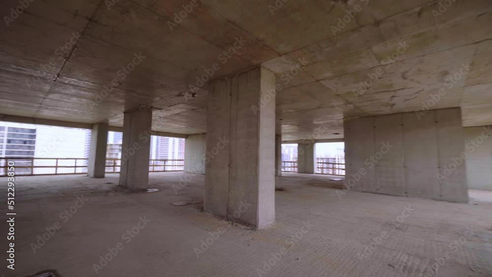 Concrete interior of new building under construction. Concrete wall ...