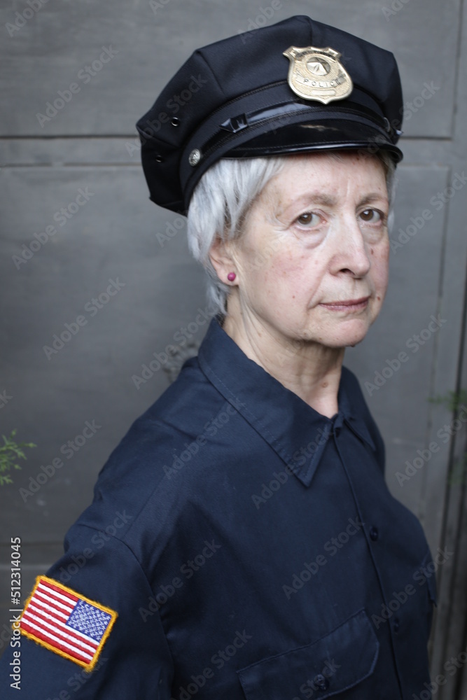 Senior police officer wearing traditonal uniform Stock Photo | Adobe Stock