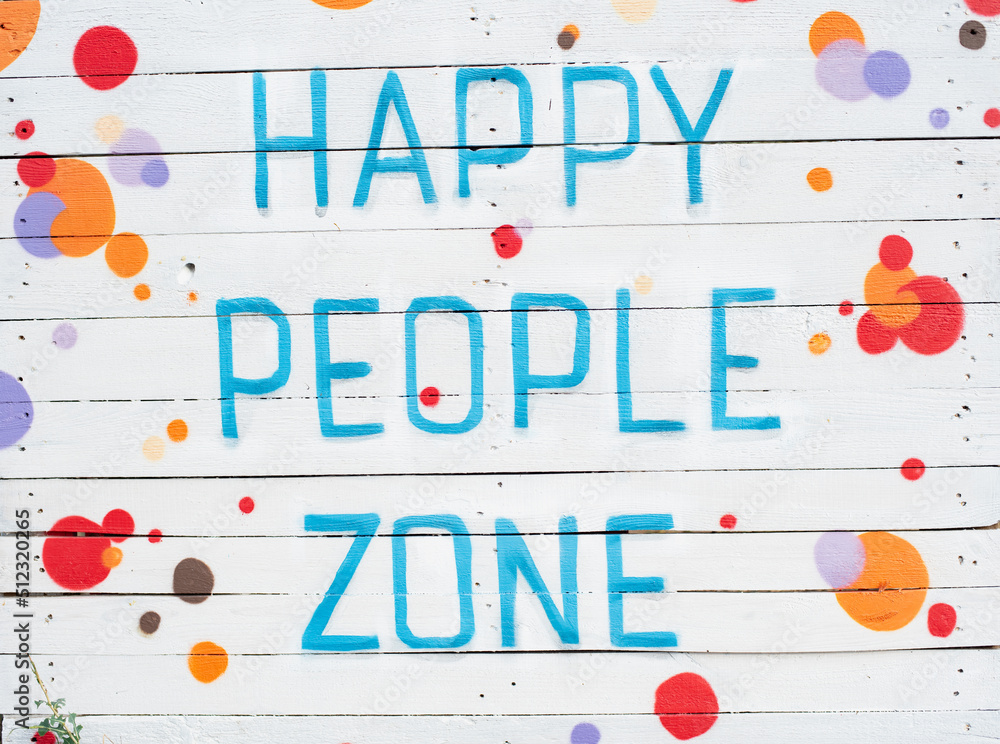 Text in English Happy people zone on white wooden plank background ...