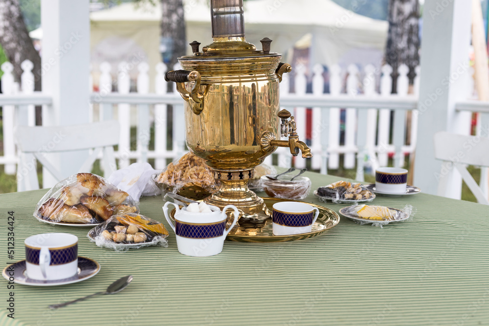 Tatar tea party with chak-chak and other traditional sweets. Hot tea ...