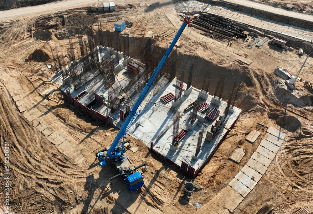 Сonstruction site, aerial view. Monolithic slab foundation and concrete ...