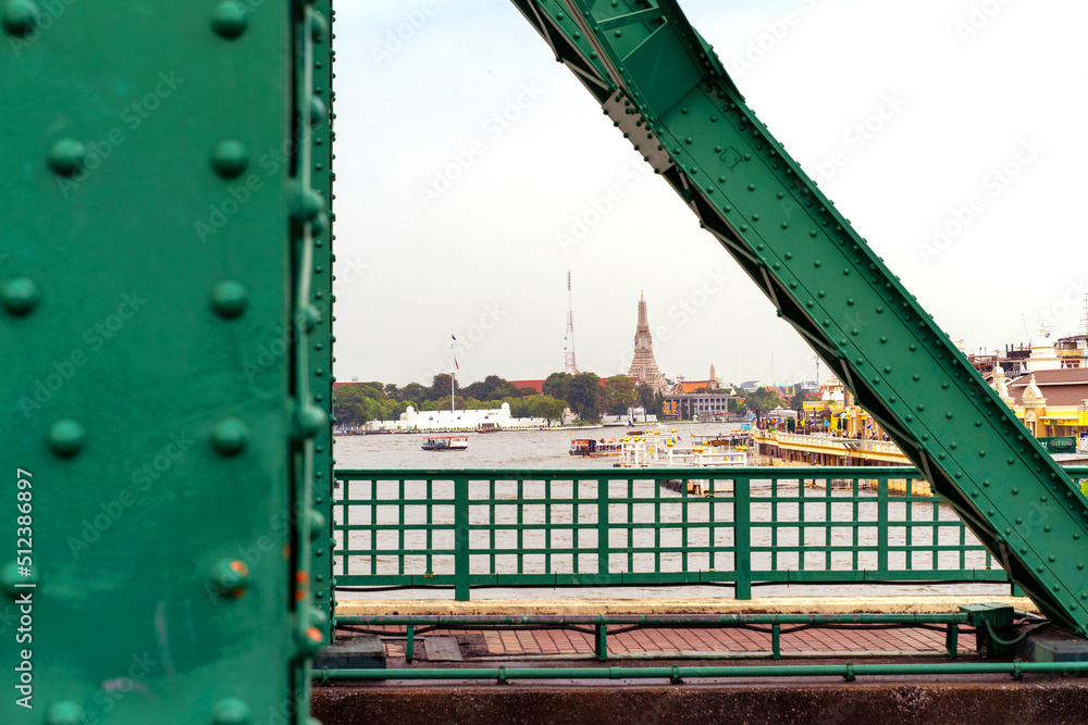 Thailand, Bangkok, the Buddha Bridge is made of steel and is green in ...