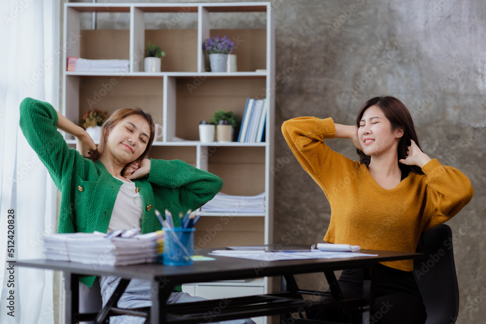 Working woman relaxing, a businesswoman in office, she is relaxing ...