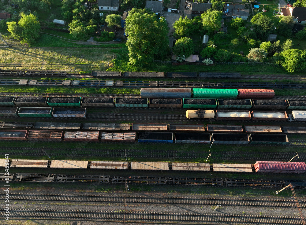 Railway yard with freight rail wagons. Cargo trains with goods on ...