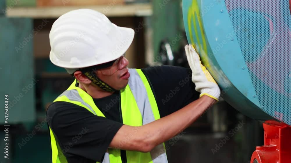 First Aid and safety first concept. Male factory worker arm stuck in ...