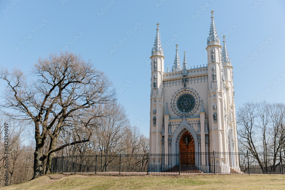 Spire of the Church in the medieval Gothic style. Gothic chapel. Top of ...