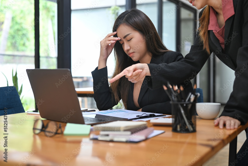 Dissatisfied boss scolding young employees, verbal warning about work ...