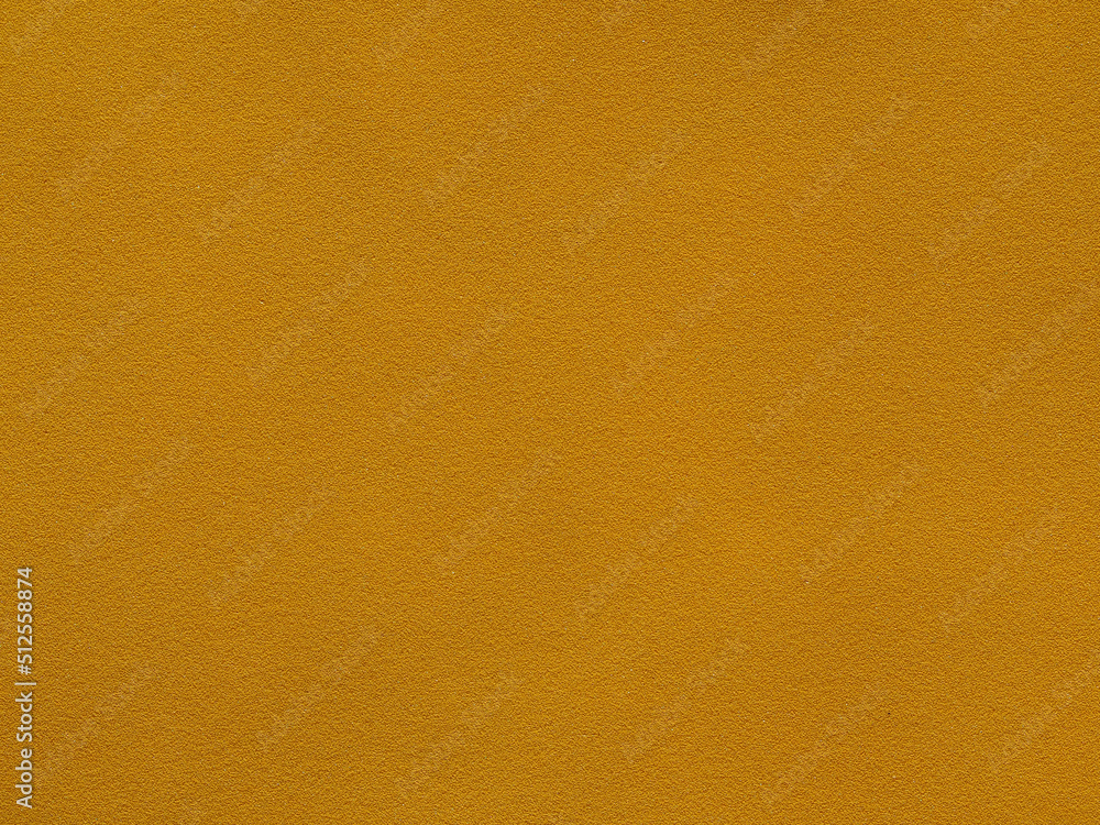 Yellow texture surface as a background. Dark yellow texture pattern of ...