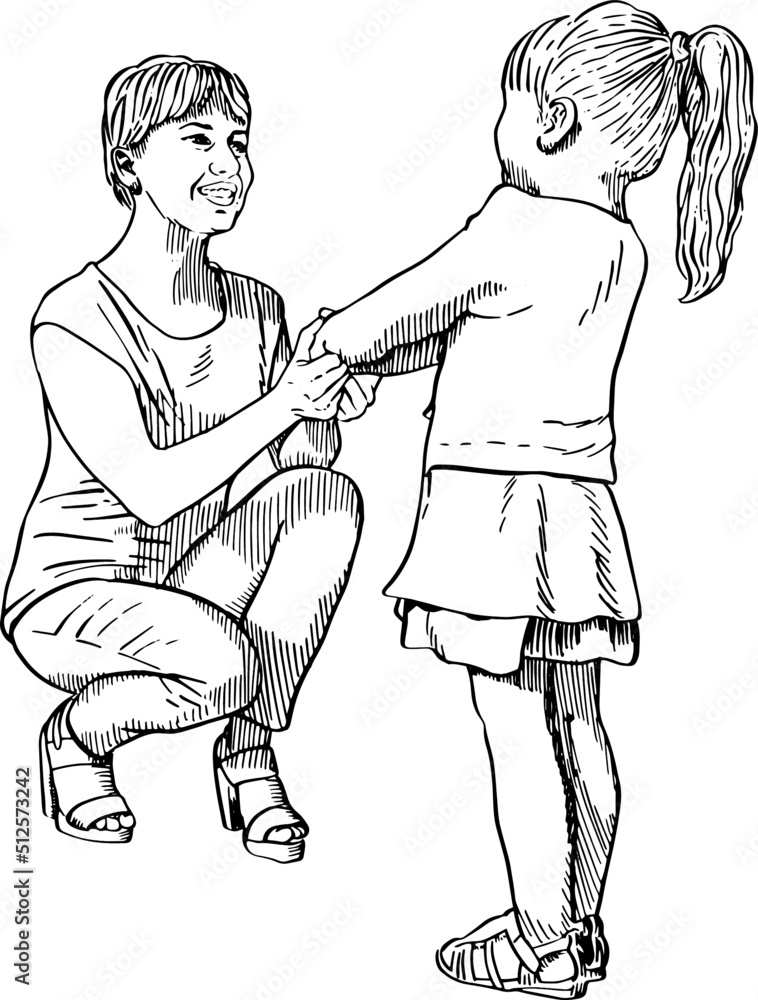 Crouching mom taking little daughter's hands standing in front of her ...