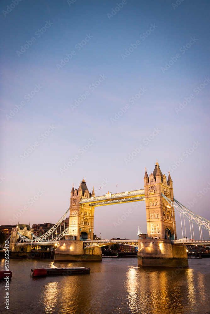 Tower Bridge and the River Thames, London. A dusk view over the Thames ...