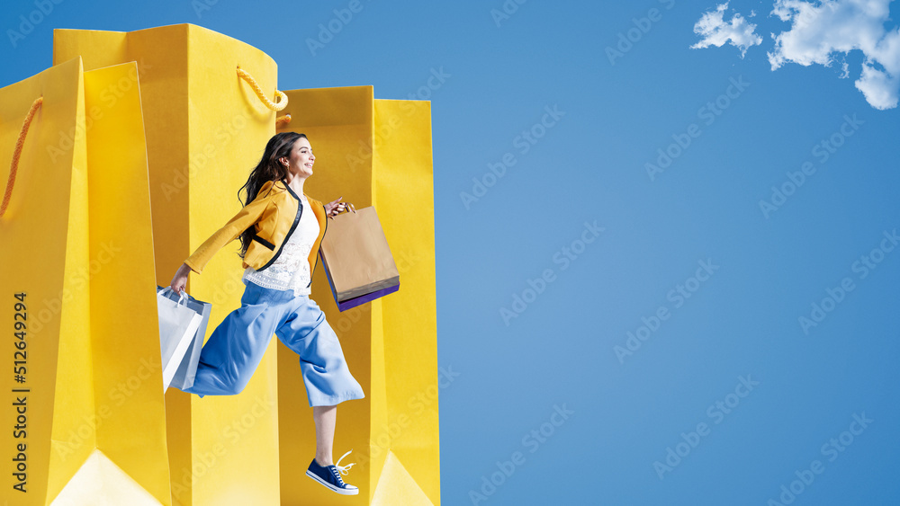 Cheerful woman shopping and big shopping bags Stock Photo | Adobe Stock Cheerful woman shopping and big shopping bags Stock Photo | Adobe Stock