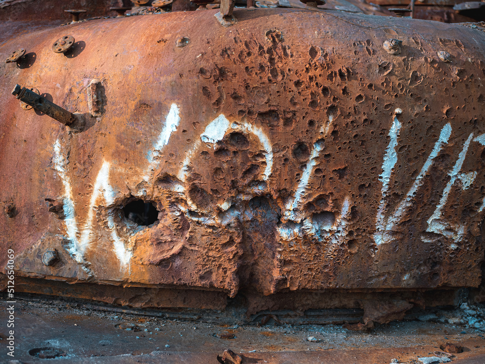 War in Ukraine, pierced armor, a hole in the armor of a tank turret, a ...