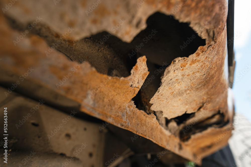 Rusty car body damaged by corrosion with hole on threshold Stock Photo ...