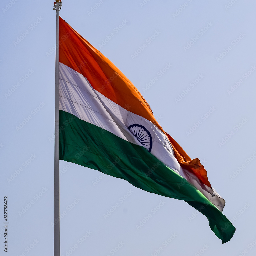 India flag flying high at Connaught Place with pride in blue sky, India ...