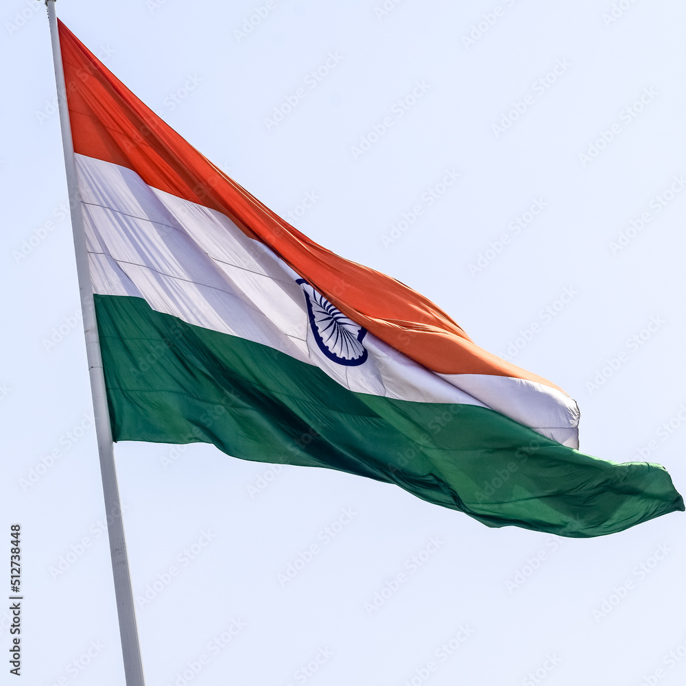 India flag flying high at Connaught Place with pride in blue sky, India ...