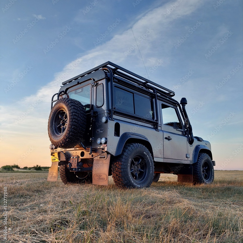 Road trip with a Land Rover Defender. Recreational travel activity ...