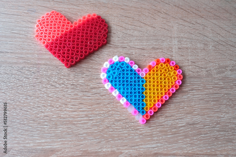 close-up of blue yellow heart, creating perler bead patterns, make flag ...