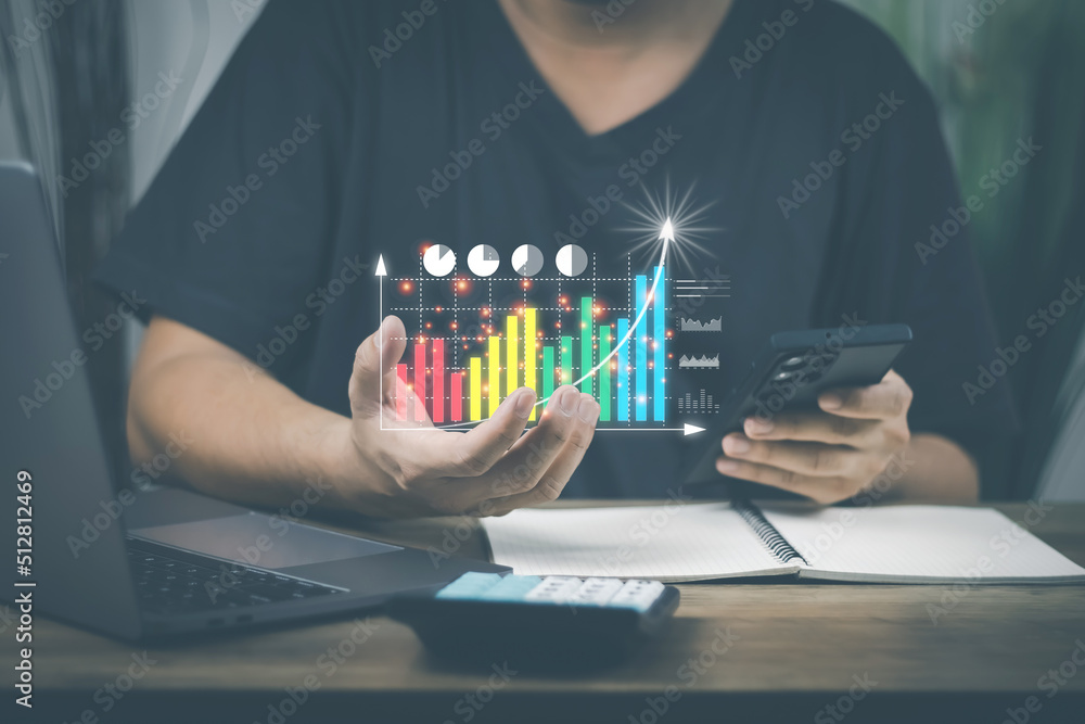 financial and investment technology concept,man's hand using computer ...