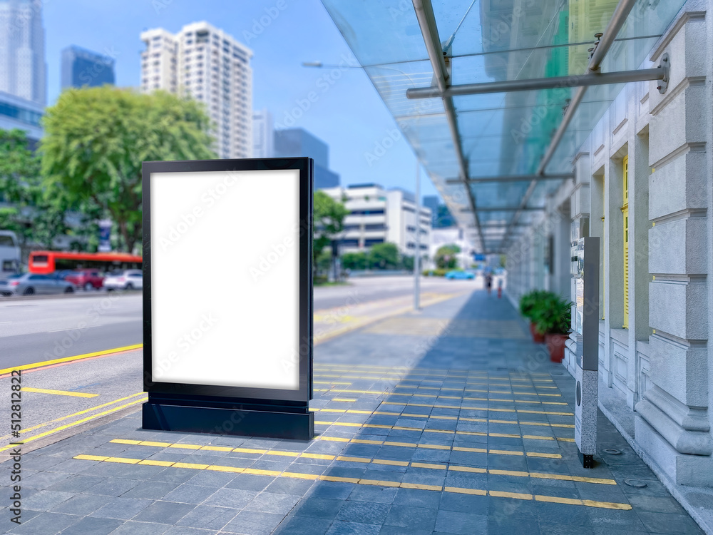 Blank vertical advertising poster banner mockup at bus stop shelter by ...