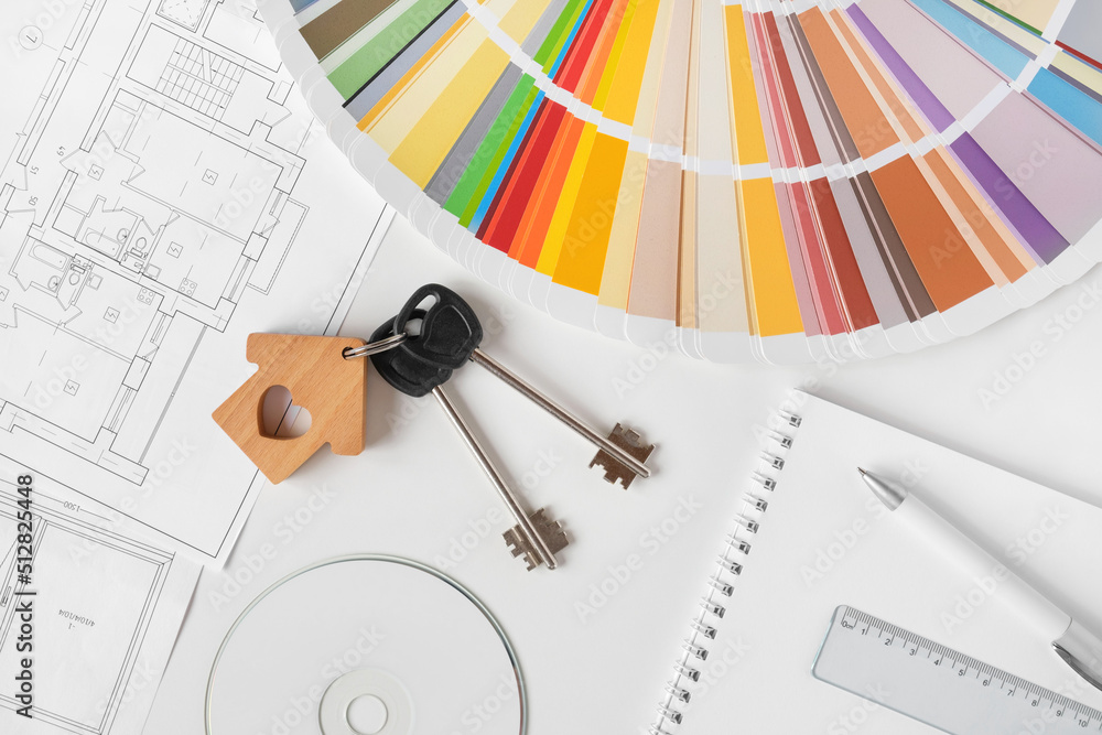 Foto de Hands choosing Colors of Interior Design from the Color Guide ...