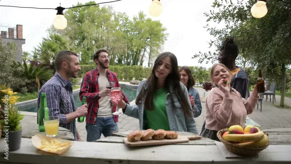 Video Stock Multi ethnic group friends having fun at pool kiosk bar ...