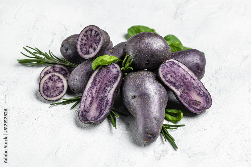 Raw sweet potatoes or batatas isolated on white background. Batata ...