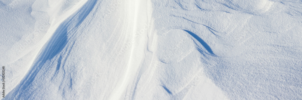Snow texture. Wind sculpted patterns on snow surface. Wind in the ...