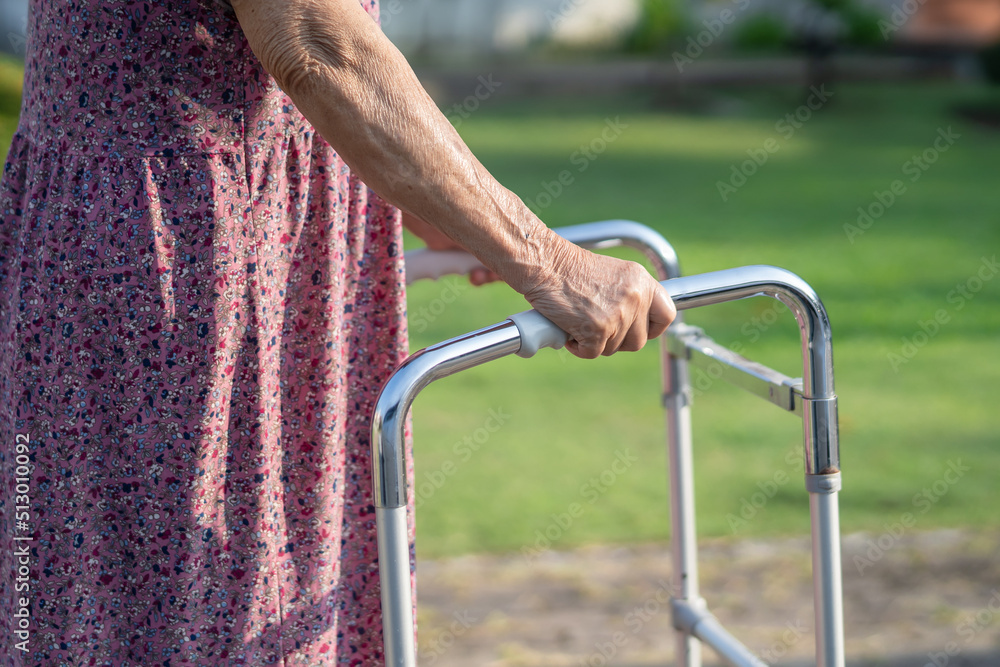 Asian senior or elderly old lady woman use walker with strong health ...