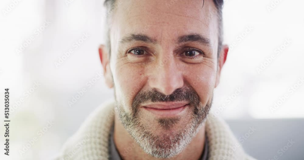 Portrait of a handsome smiling mature mans face with a grey beard ...