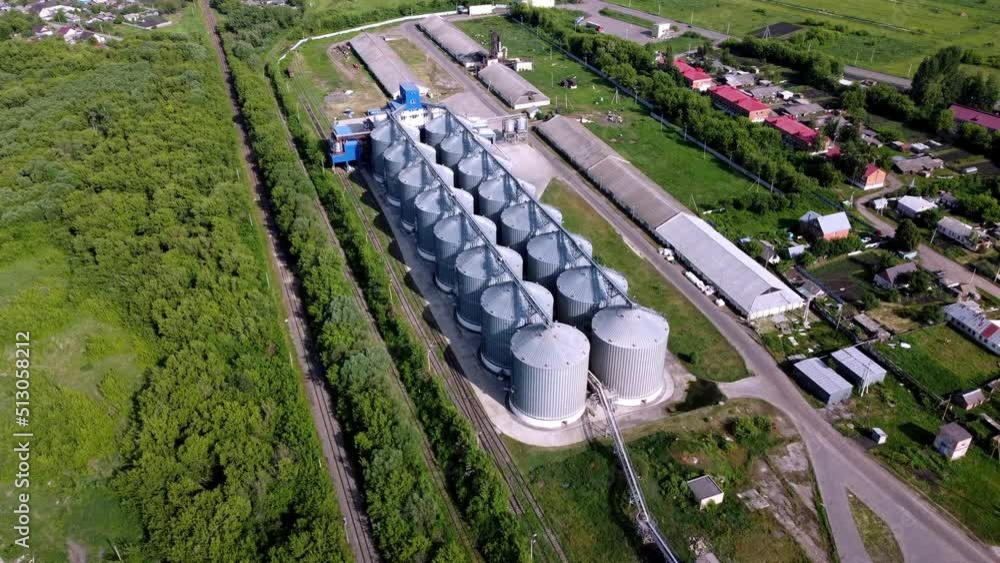 Modern grain silo elevator, view from a height and from different ...