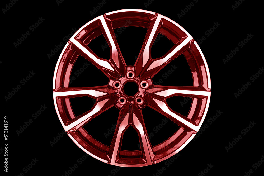 Red car alloy wheel isolated on black background. New alloy wheel for a ...