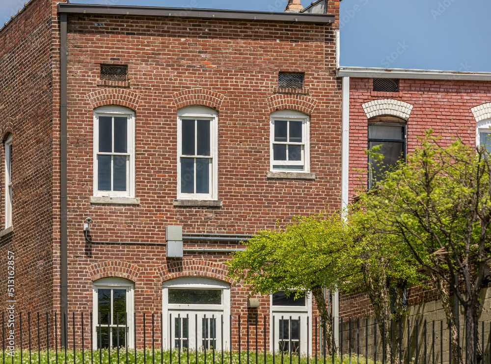 Beautiful view of the exterior design of a brick house with white ...