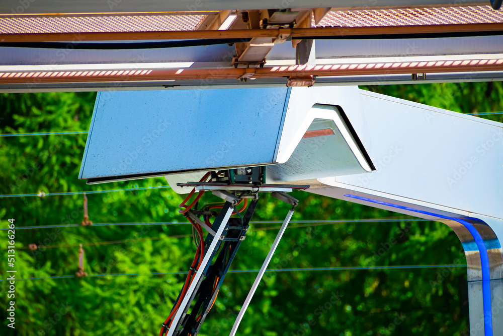 pantograph of the electric bus charging station. the process of ...