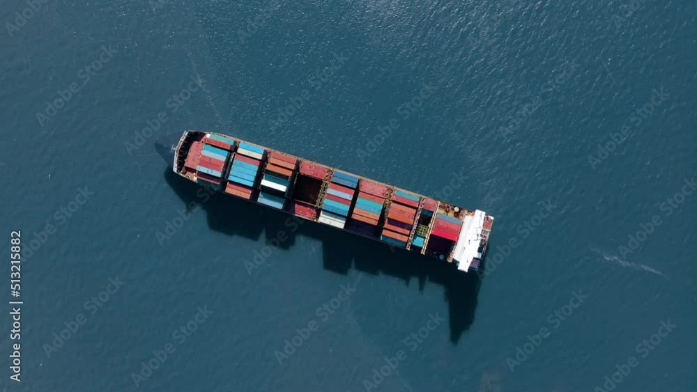 Aerial top view of smart cargo ship carrying container. Concept ...