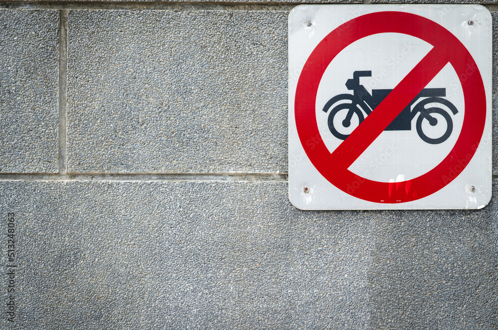 Motorcycle no entry sign install on concrete wall in front of tunnel ...