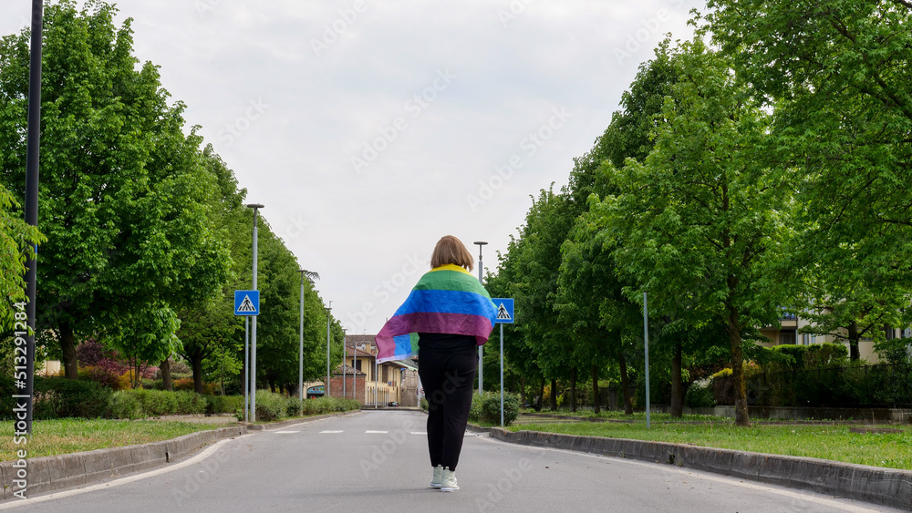 Bisexual, lesbian, female, transgender walk with rainbow LGBTQIA flag ...