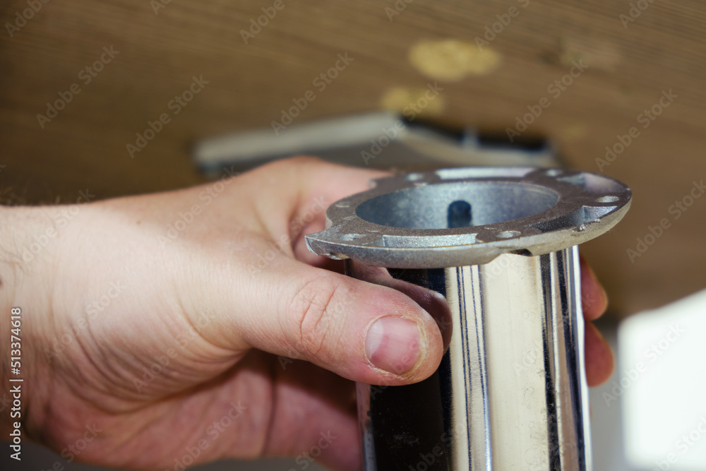 Broken leg of an office desk, repair of furniture made of wood and ...