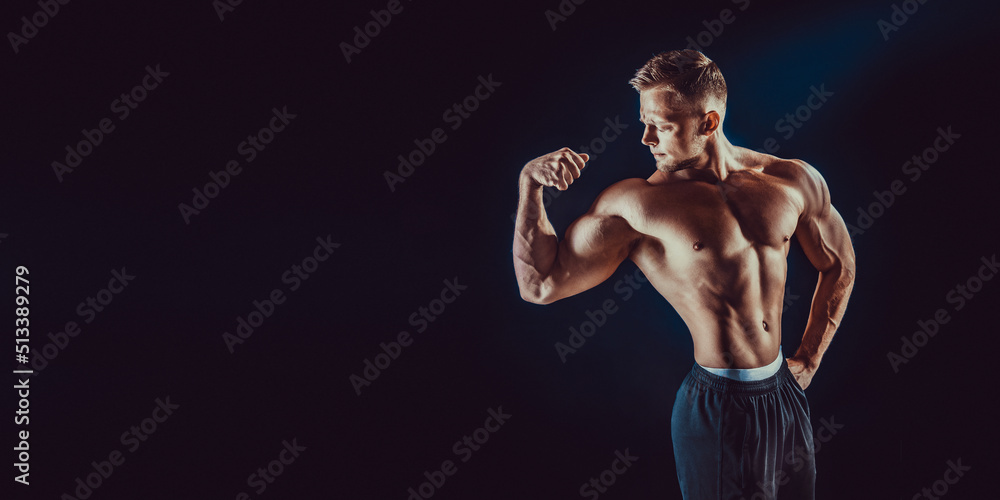 bodybuilder posing. Beautiful sporty guy male power. Fitness muscular ...