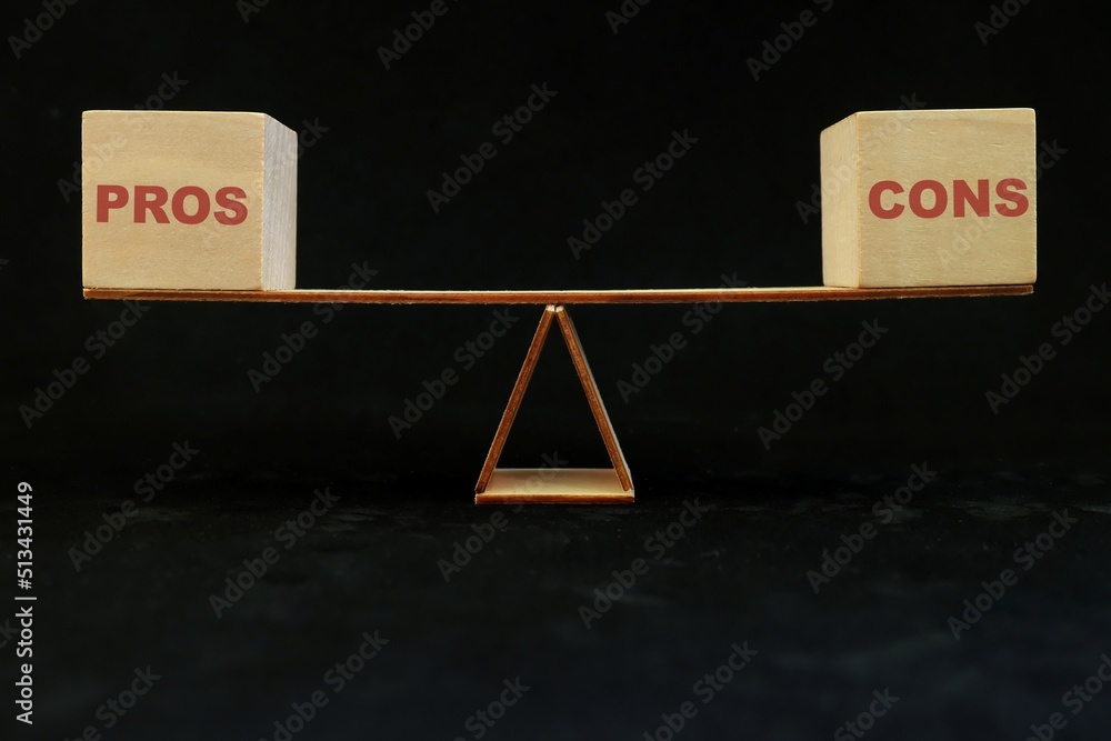 Balance and weigh in and pros versus cons concept. Pros and Cons word ...