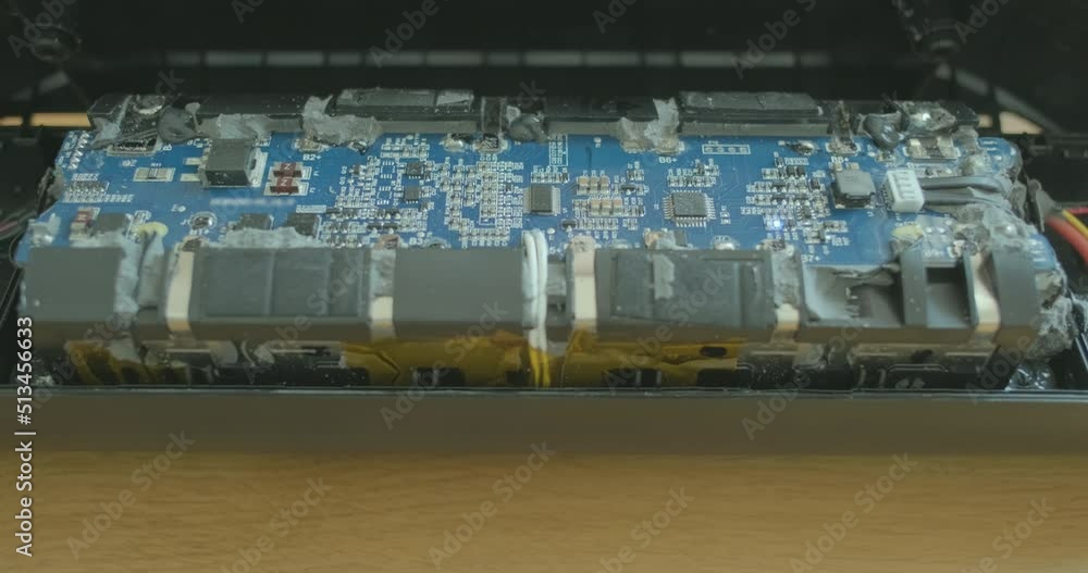 disassemble battery controller, top view, remove cover. Circuit board ...